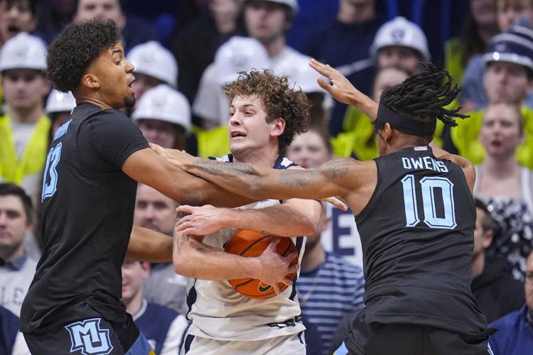 Stevie Mitchell has career night as No. 9 Marquette overcomes foul trouble to beat Butler 78-69