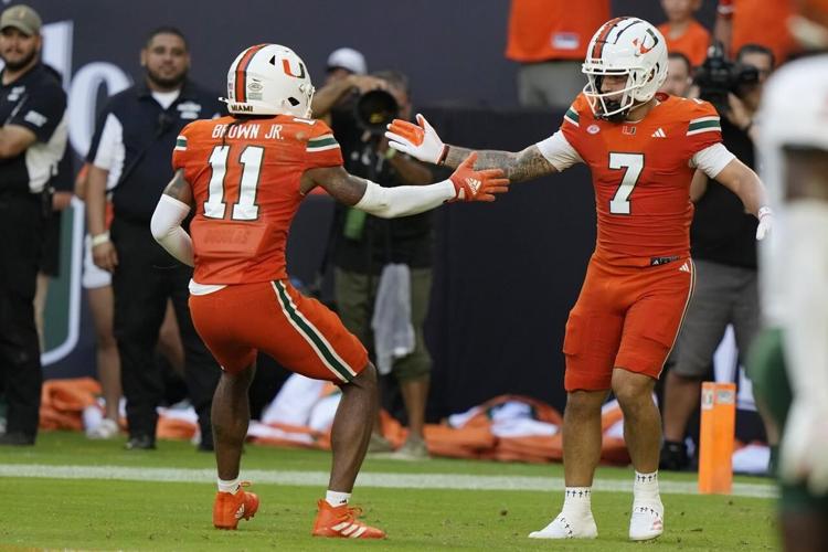Cam Ward passes for 3 TDs, runs for another and No. 12 Miami rolls past ...