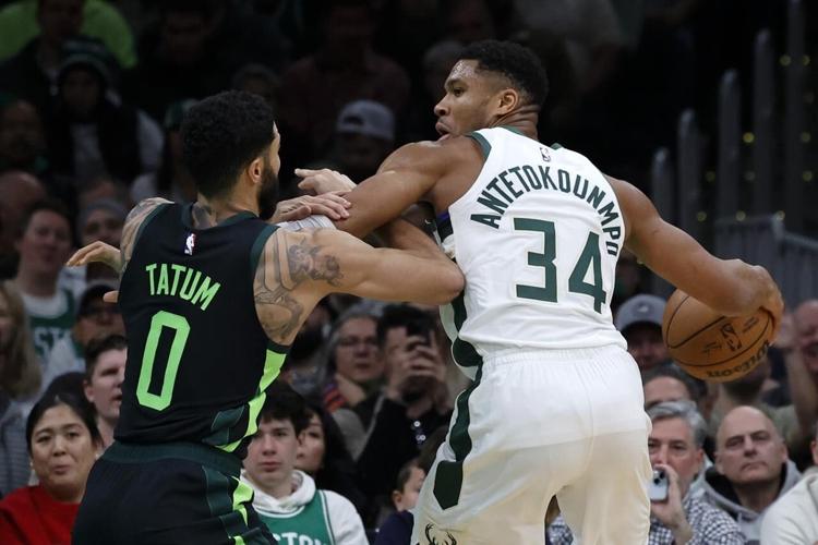 Jayson Tatum scores 34, Celtics beat Bucks 111-105 to spoil Khris Middleton's season debut