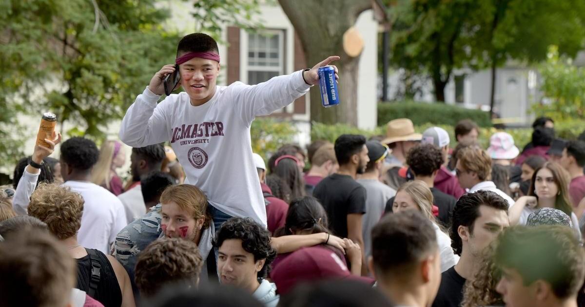 Fake homecoming crowd swells in streets near McMaster