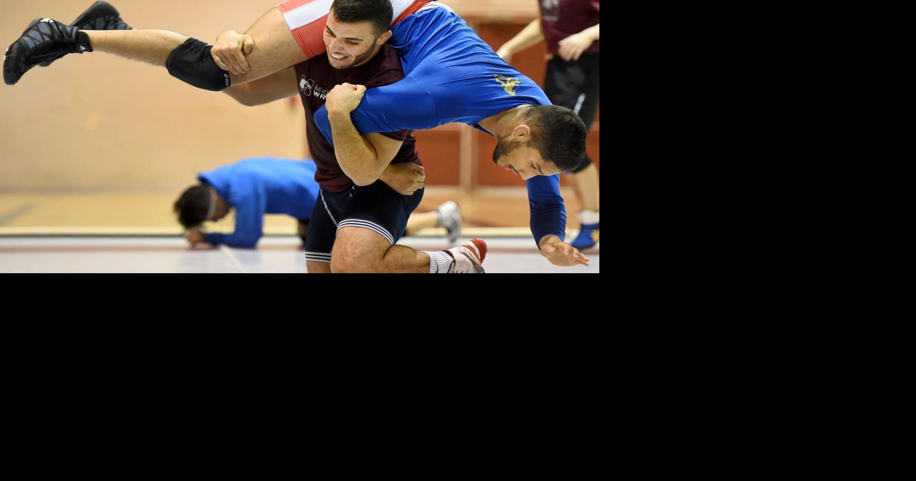 Hamilton wrestling coach beats defamation suit