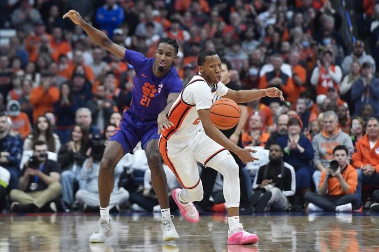 Girard reaches 2,000 career points, leads Clemson past Syracuse 77-68