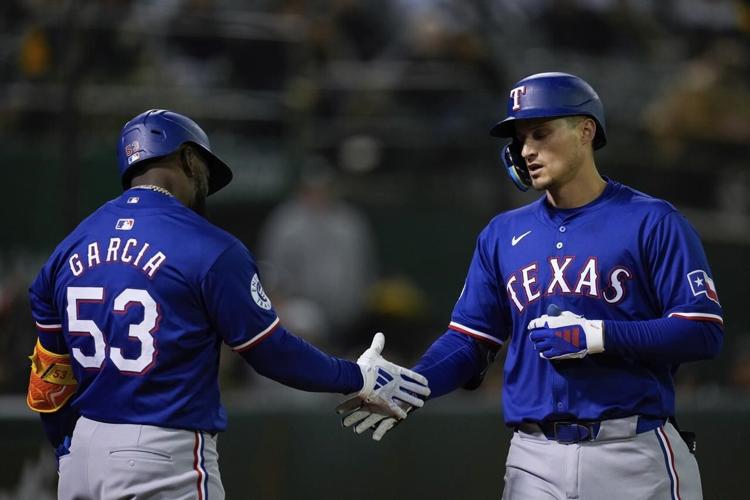 Corey Seager hits a 3-run homer in the 8th inning to rally the Rangers past the A's 4-2