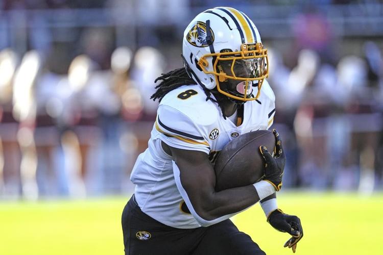 Carroll runs for 3 TDs, Missouri beats Mississippi State 39-20