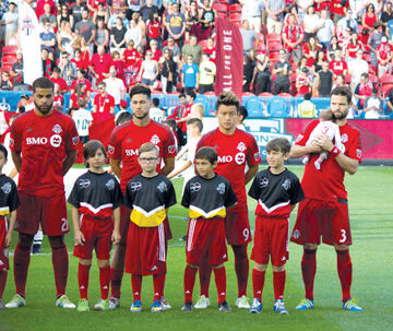 Ancaster Soccer Club players and families cheer on TFC
