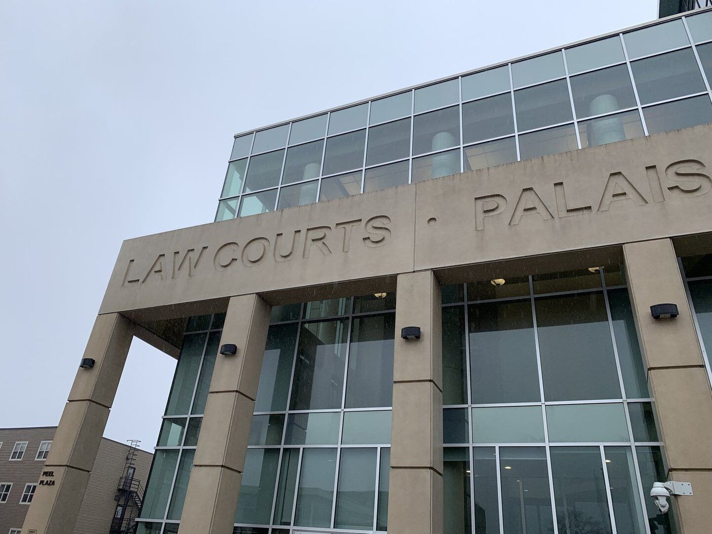 Man charged with murder, woman accused of aiding escape in shooting