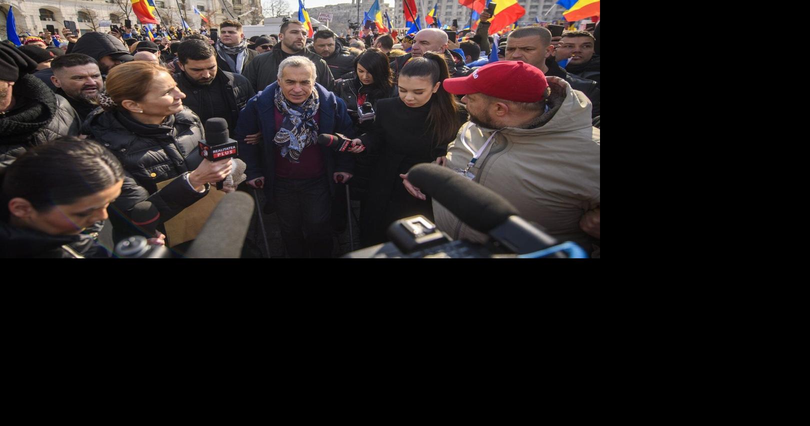 Thousands rally in Romania's capital to support far-right Georgescu ...
