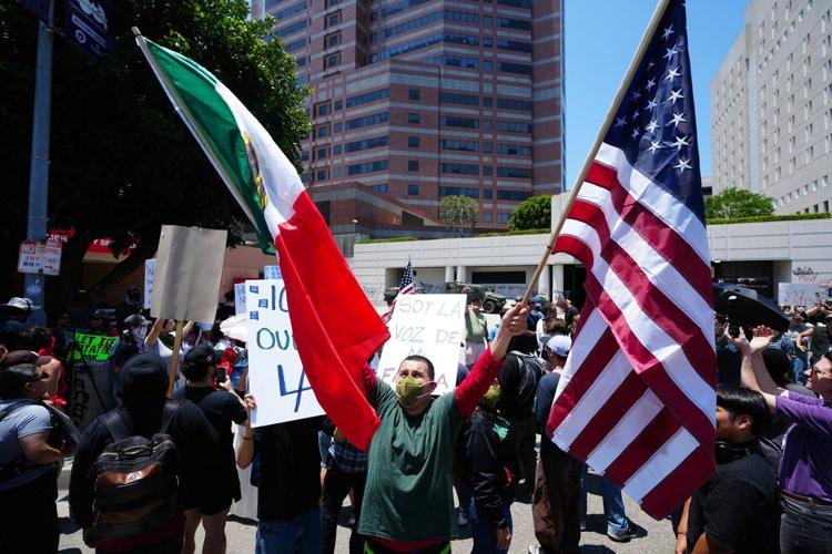 AP PHOTOS: Mexican flags at LA protests spark debate over symbolism