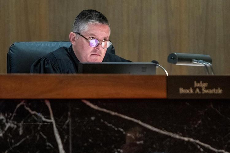 Michigan court hears arguments over murder charge against ex-police ...