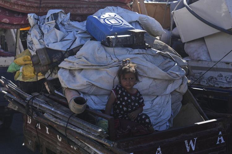 Photos of thousands of Palestinians fleeing Gaza City as Israel begins ...