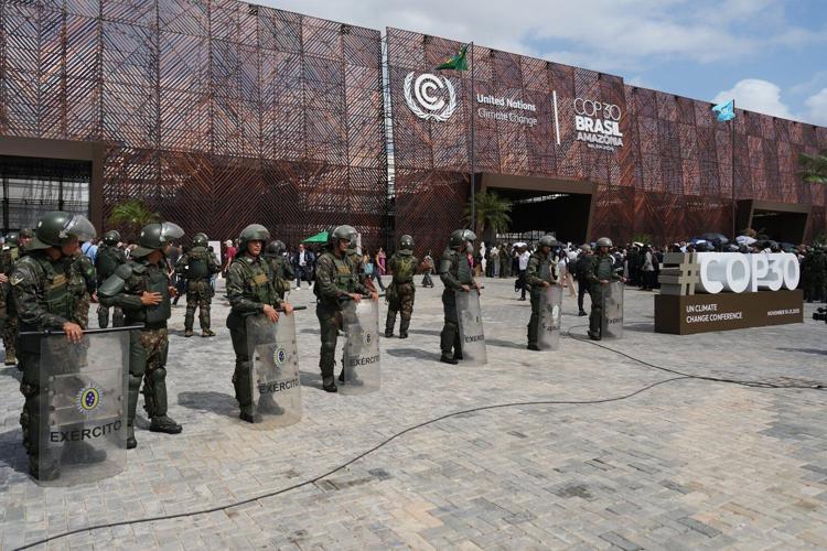 Protesters block the main entrance to COP30 climate talks in Brazil