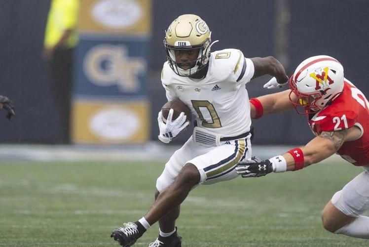 Haynes King throws 3 TD passes as Georgia Tech routs VMI 59-7