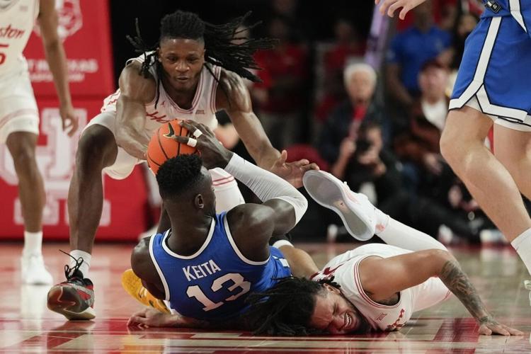 Emanuel Sharp scores 18 to lead No. 14 Houston over BYU 86-55