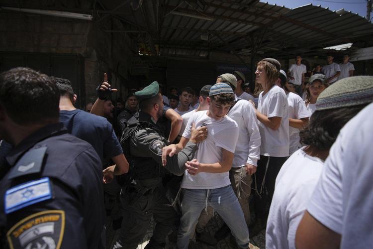 Thousands of Israeli nationalists chant 'death to Arabs' during annual ...