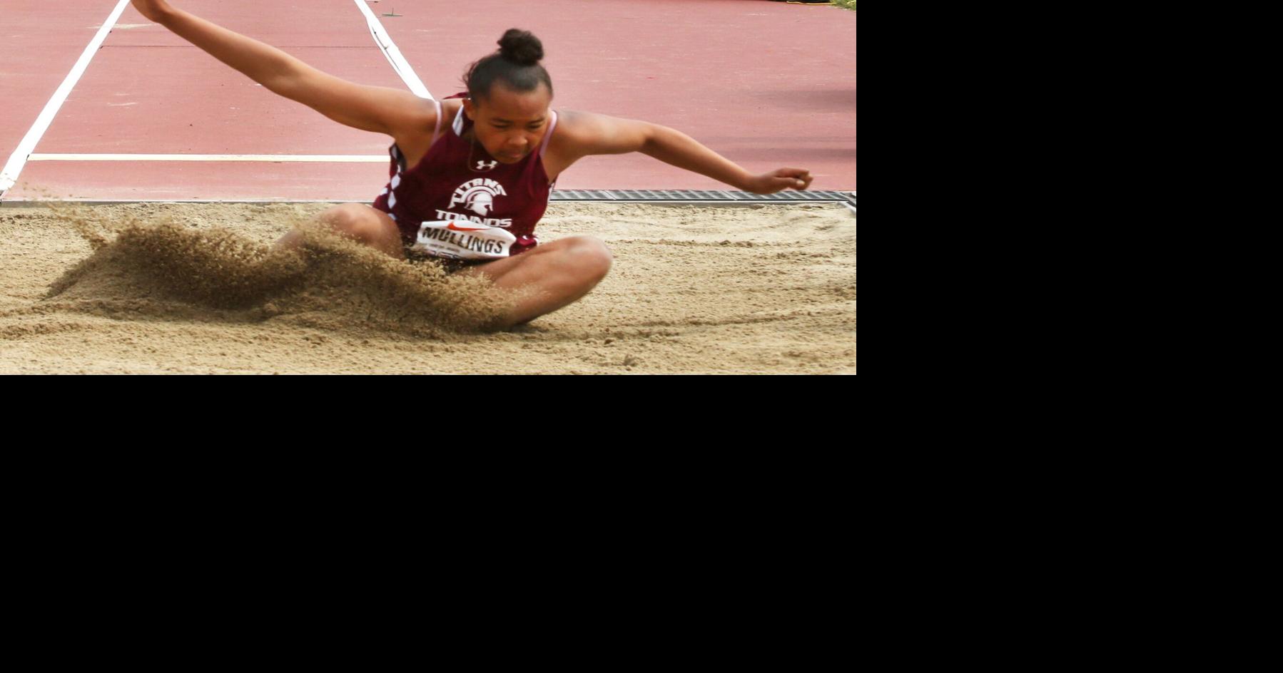 Jaden Mullings of Hamilton's Bishop Tonnos leaps to OFSAA gold