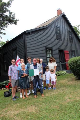 Bronze plaque highlights Colchester’s Snider House history