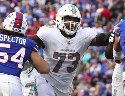 Dolphins place right tackle Austin Jackson on injured reserve and ...