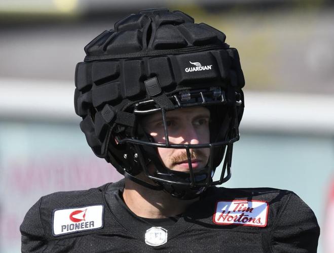 Why the Ticats are wearing those giant helmets at practice