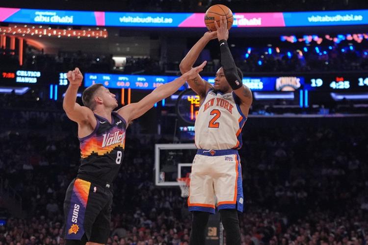 Booker returns from ankle injury to lead the Suns to a 106-99 victory ...