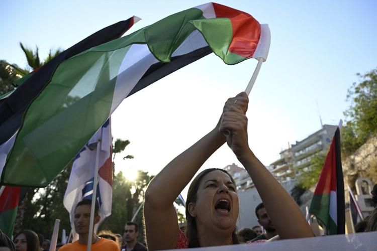 Greek protesters rally against an Israeli cruise ship as EU unions ...