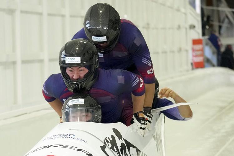 Friedrich leads 4-man world bobsled title race as weather takes its ...