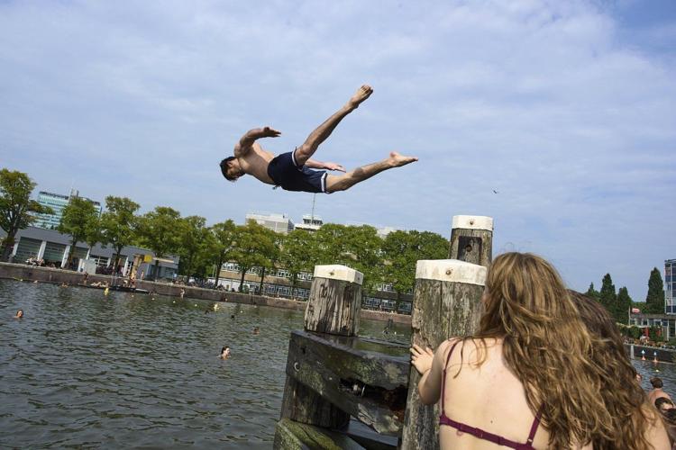 Surrounded by water, Dutch swimmers have plenty of places to cool off