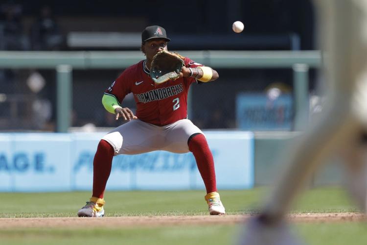 McCann homers and drives in 4 runs to help the Diamondbacks beat the ...
