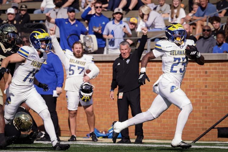 Ashford throws for three TDs as Wake Forest whips Delaware 52-14