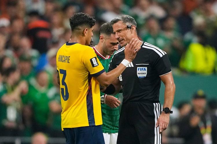 Why are World Cup refs giving red cards to players covering their ...