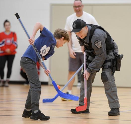 ‘Cops and Kids’ battle for hockey bragging rights