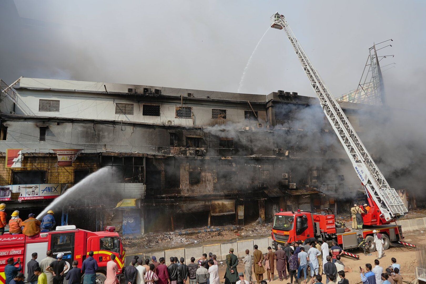 Karachi mall fire death toll rises to 23 as rescuers search for dozens ...
