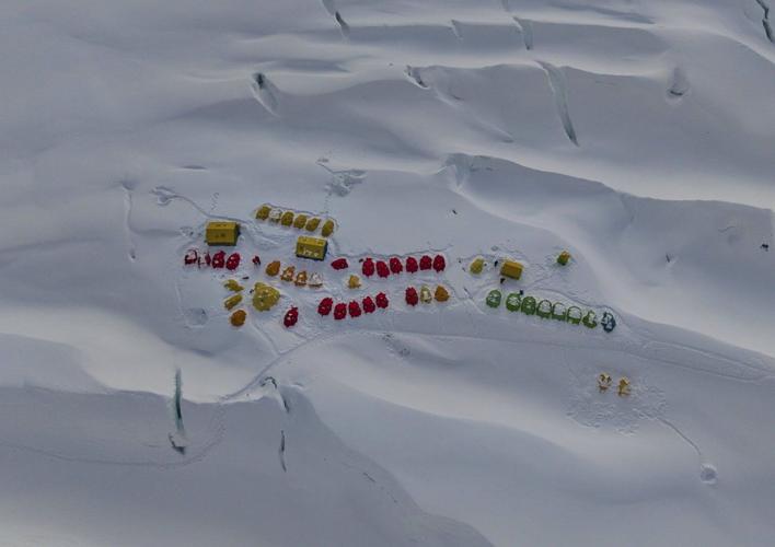 AP PHOTOS: Hundreds scale Mount Everest in a weather-hit climbing season
