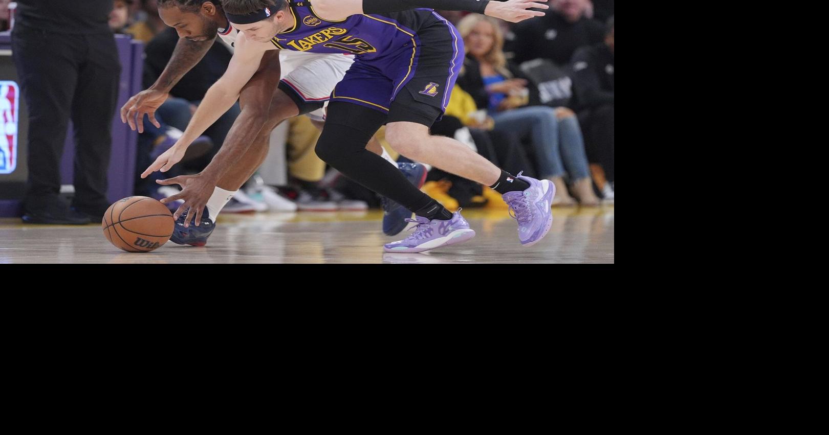 Lakers G Austin Reaves sidelined by right calf injury in first quarter ...