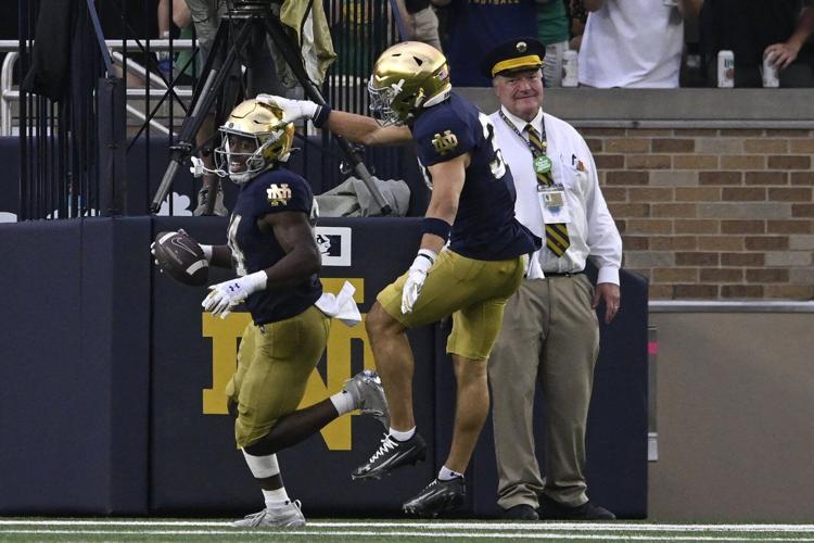 No. 22 Notre Dame content to grind it out with backfield tandem of Jadarian Price and Jeremiyah Love