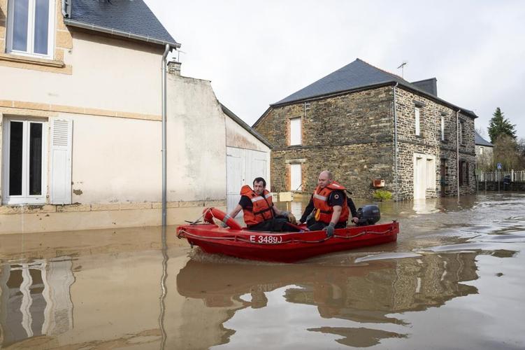 French residents rescued from flooded homes by boat as Storm Herminia ...