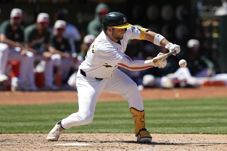 Butler homers, Sears pitches A's to series sweep of Angels with 5-0 win