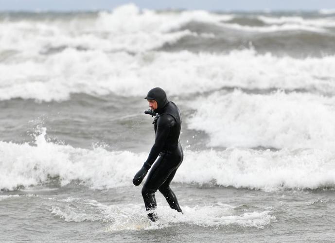 Surfing the pounding Lake Ontario waves