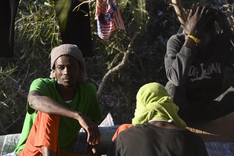 Italy works to transfer thousands of migrants who reached a tiny island ...