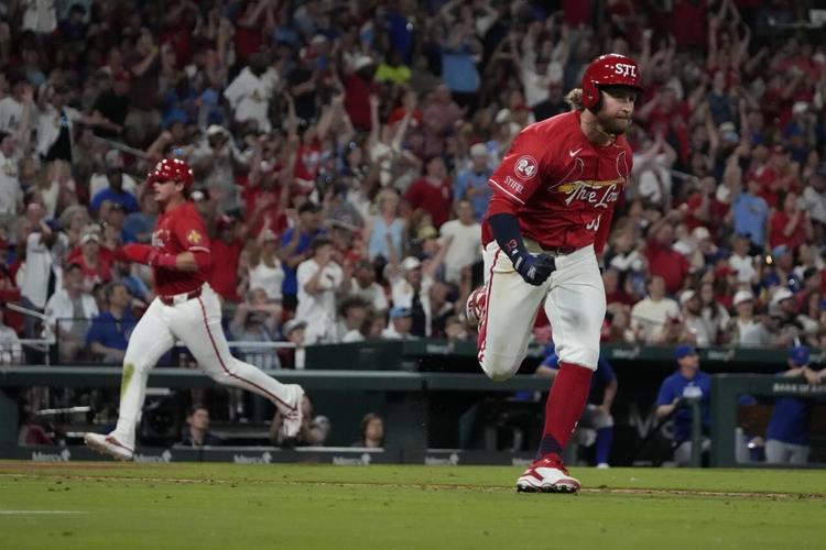 Cardinals rally in the eighth and then hold off Cubs for a 7-6 victory