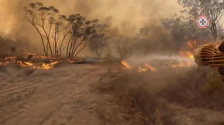 A wildfire raging for a week in eastern Australia claims a life and ...