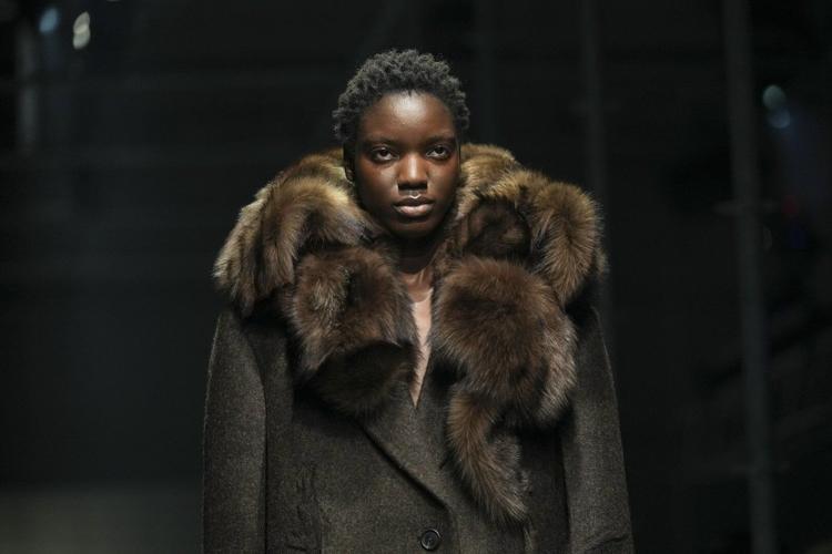 Prada reconstructs femininity starting with the little black dress fit ...