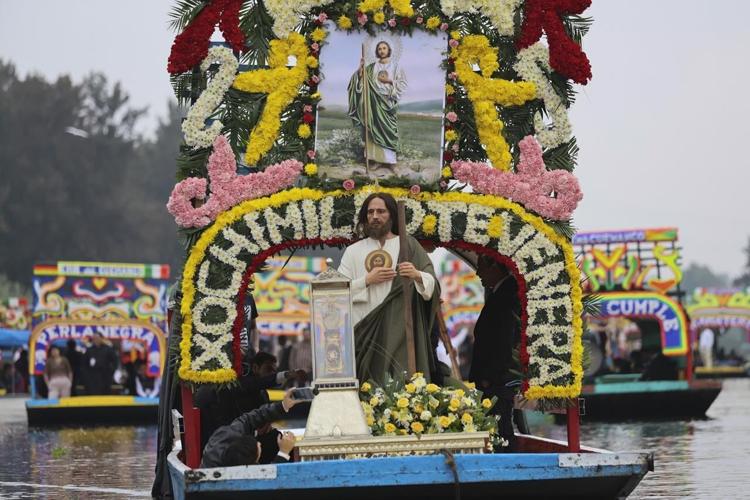 Catholic devotees honor St Jude's relic with watery procession through ...