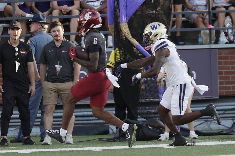 Demond Williams Jr. leads Washington over Washington State 59-24 in ...