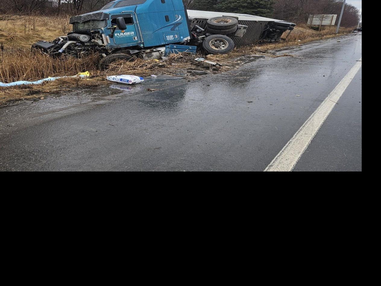 Disabled car hit by truck in crash that closed QEW lanes