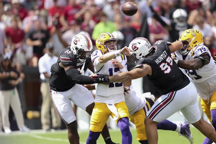 Williams' late touchdown rescues No. 16 LSU in 36-33 win at South ...