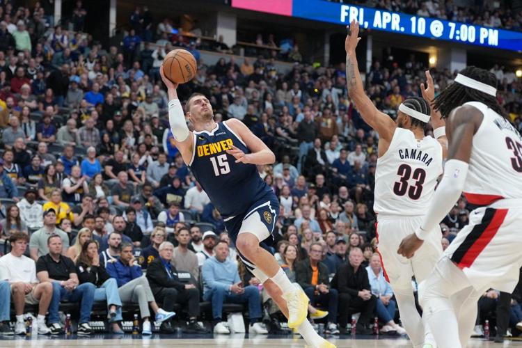Nuggets center Nikola Jokic surges into playoffs after a scary knee ...