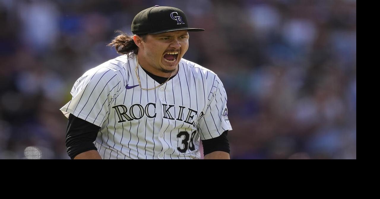 Rockies score 7 runs in the 8th in come-from-behind 9-8 win over the Braves