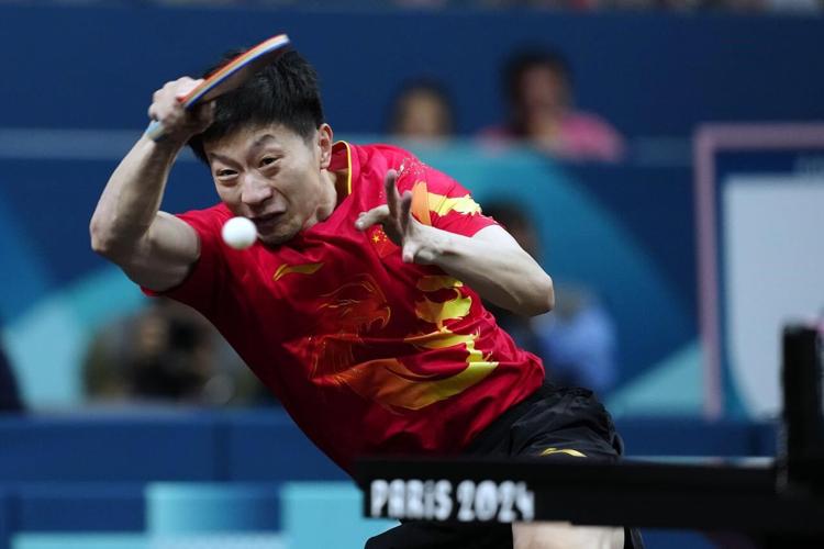 Table tennis player Ma Long makes history for China at Paris Games with ...