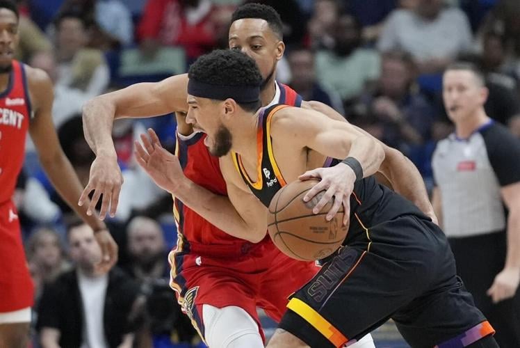 Devin Booker scores 52 points to lift the Suns over the Pelicans 124-111