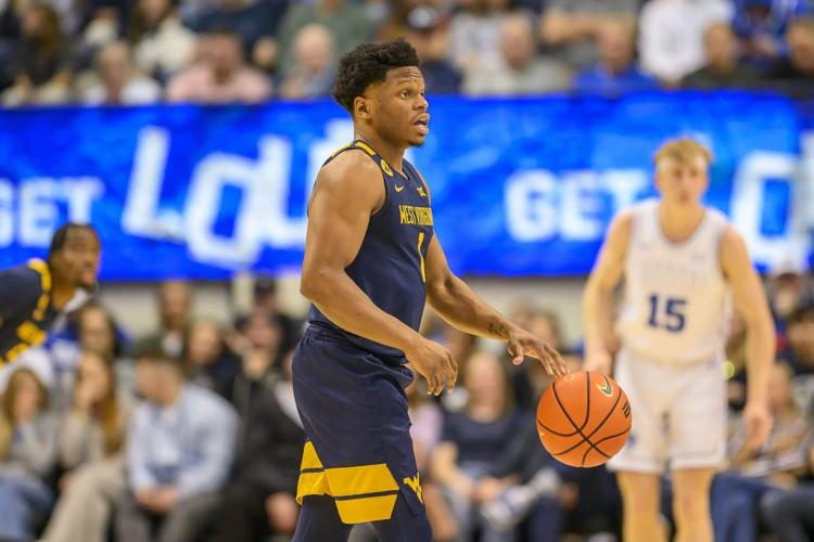 Traore leads No. 25 BYU to a 77-56 rout of West Virginia